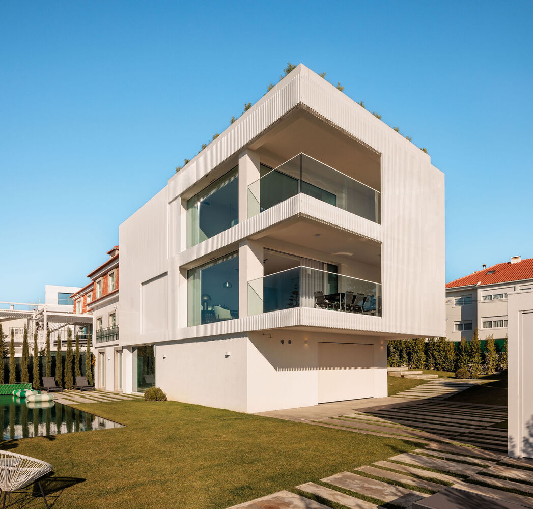 Restelo MGR House: A Modern Home Renovation That Blends Heritage with ...