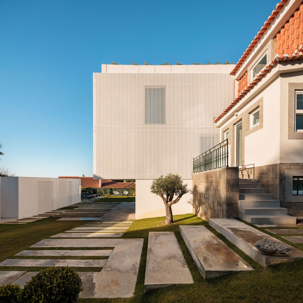 Restelo MGR House: A Modern Home Renovation That Blends Heritage with ...