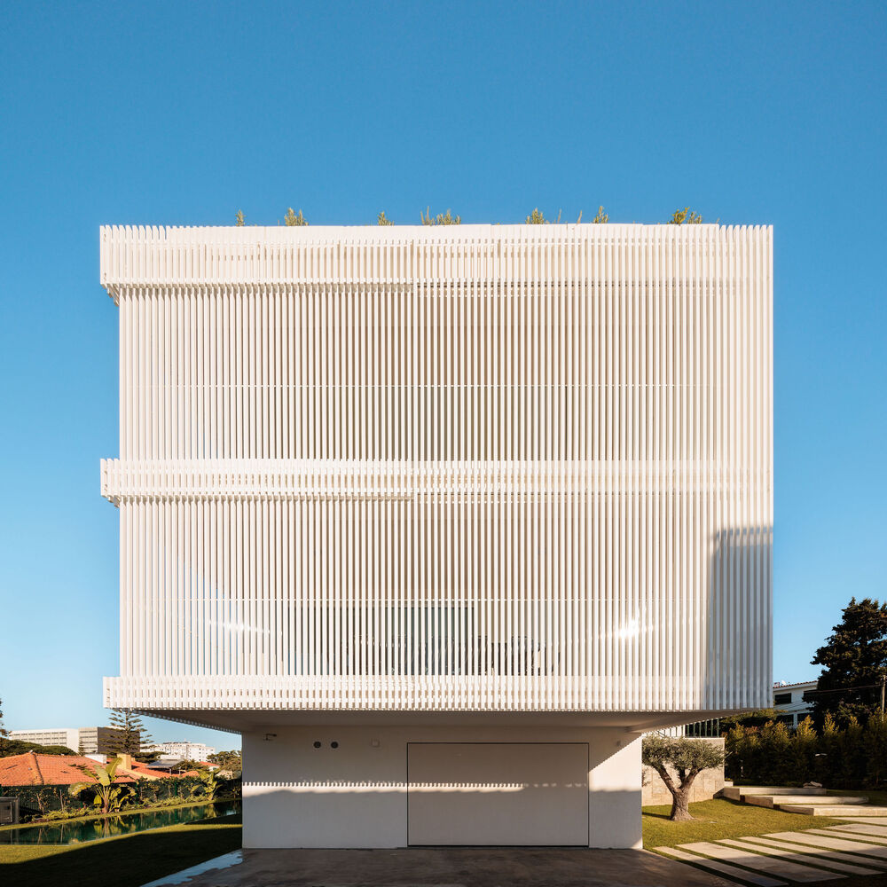 Restelo MGR House: A Modern Home Renovation That Blends Heritage with ...