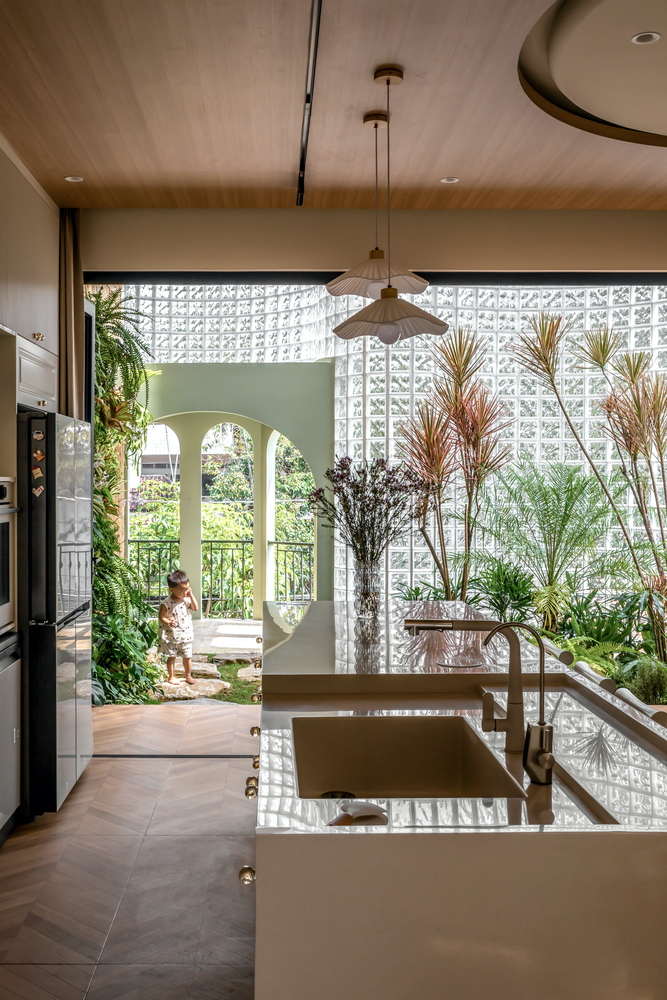 Crystal Pavilion House: A Luminous Glass Brick House by DA VÀNG Studio ...