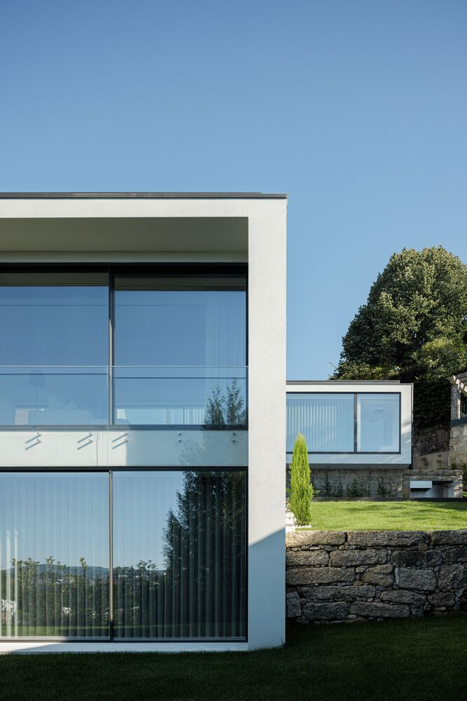 Experience the seamless integration of modern architecture with natural ...