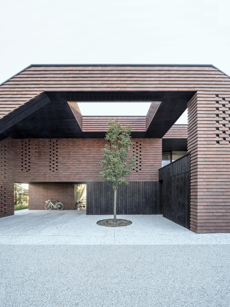 Sustainable Family Home Design: A Deep Dive into Frame House by OFIS ...